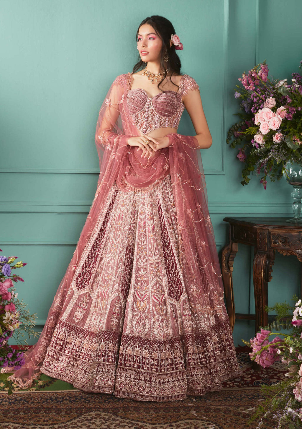 Bindani By Jigar And Nikita | Rust Rose Velvet Lehenga Set ...