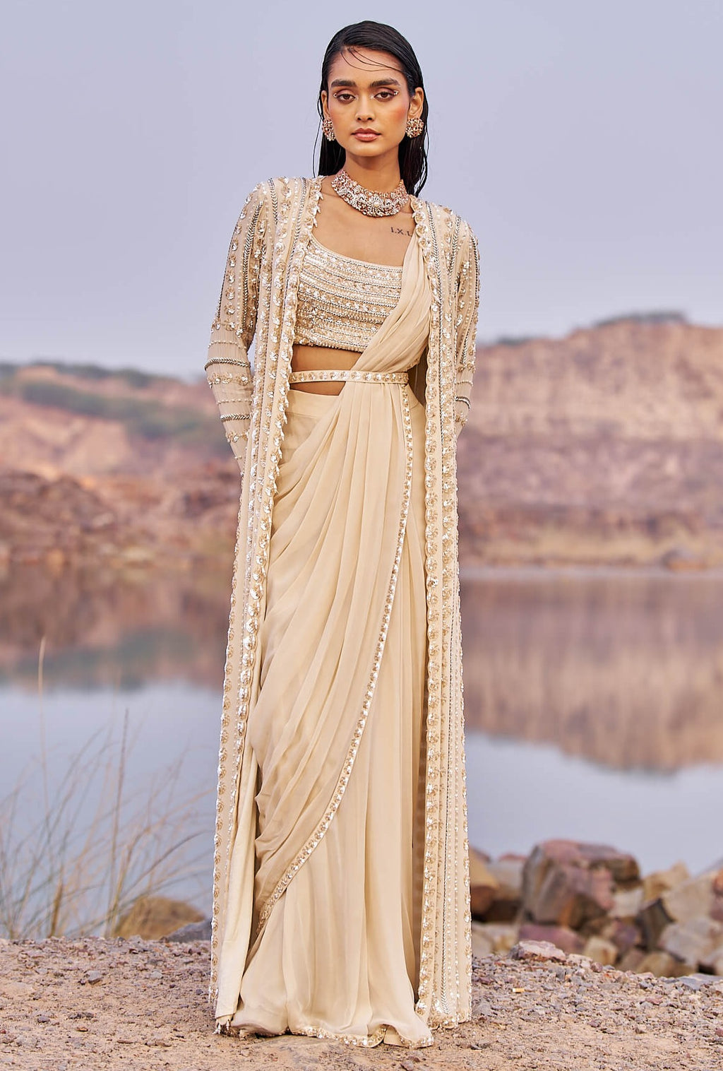 Nidhika Shekhar | Gold Tone Drape Sari And Cape Set | INDIASPOPUP.COM