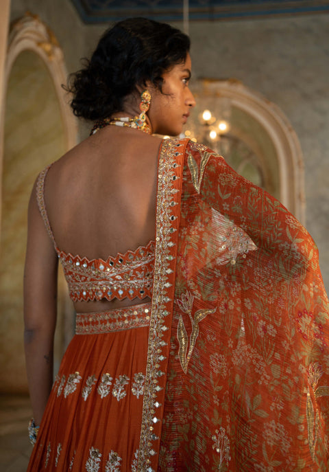 Burnt orange buti embroidered lehenga set